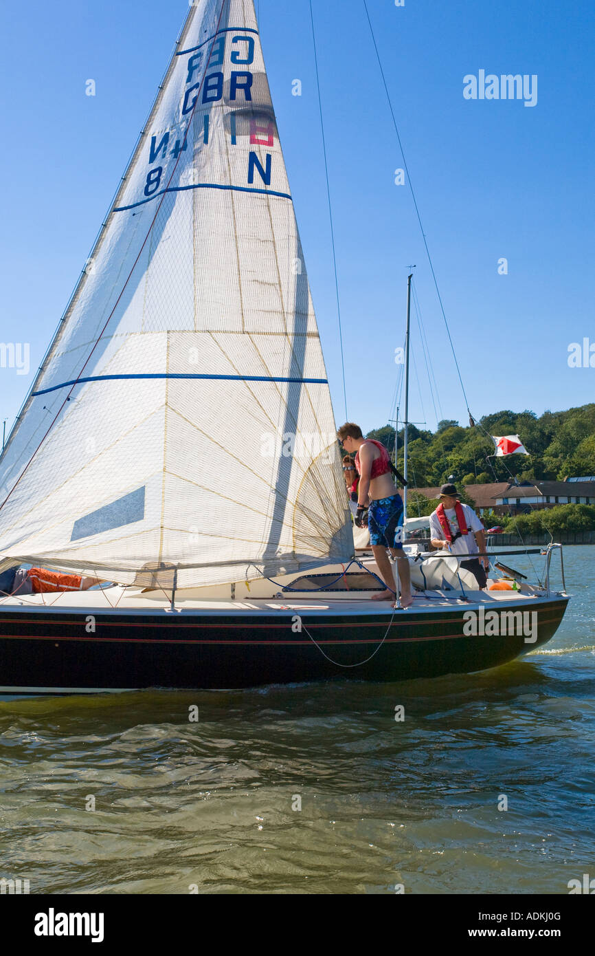 A close up of a small racing sailing boat on the river Medway at Upnor ...