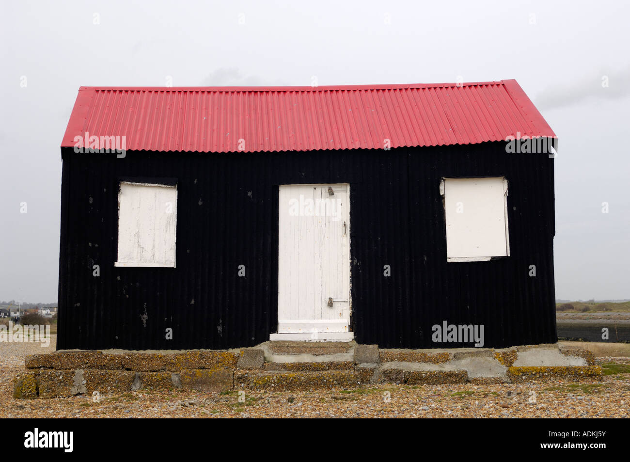 A small hut next to Rye Harbour inlet Rye East Sussex England Stock ...