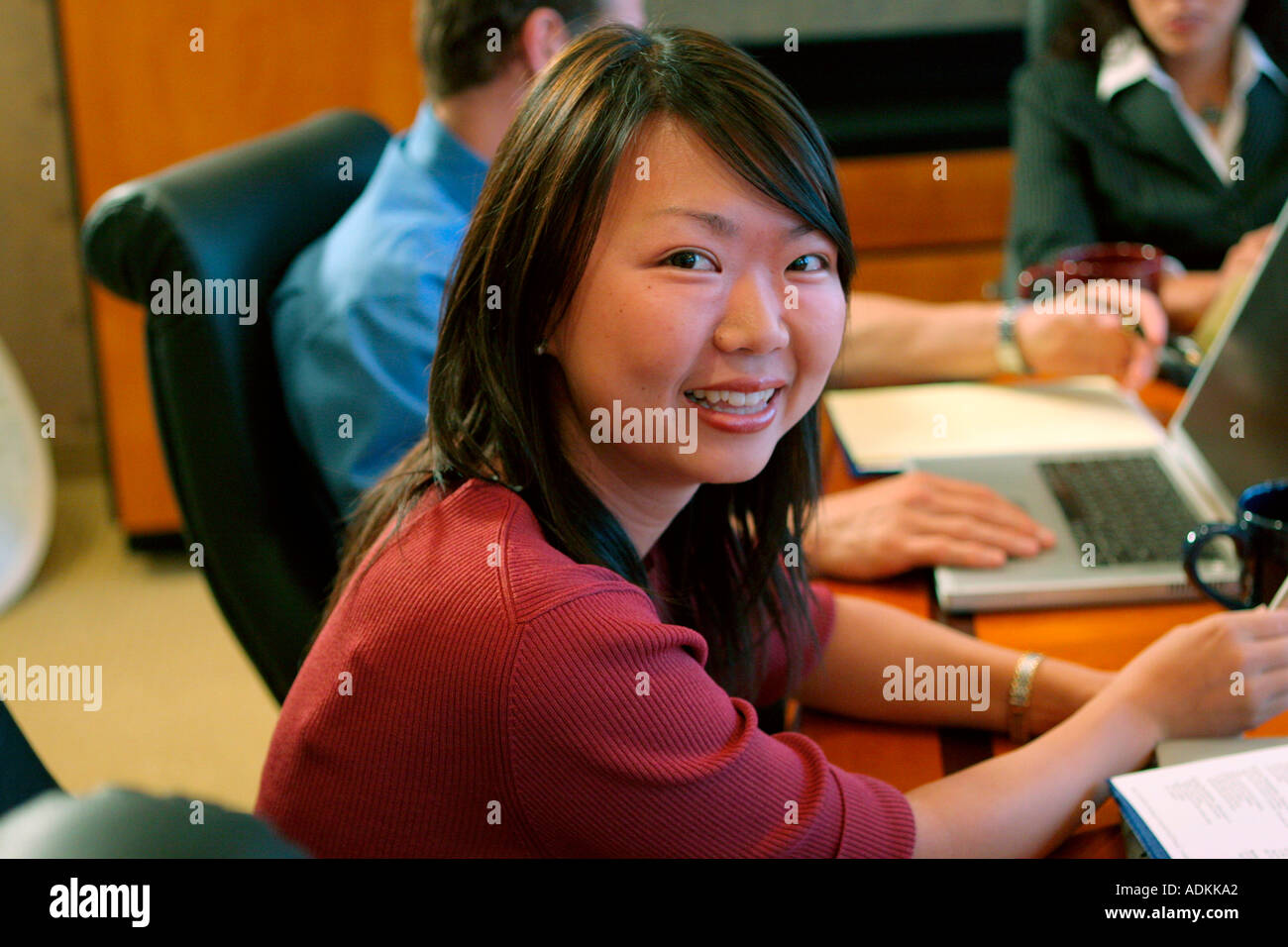 Group of business executives sitting in a conference room Stock Photo ...