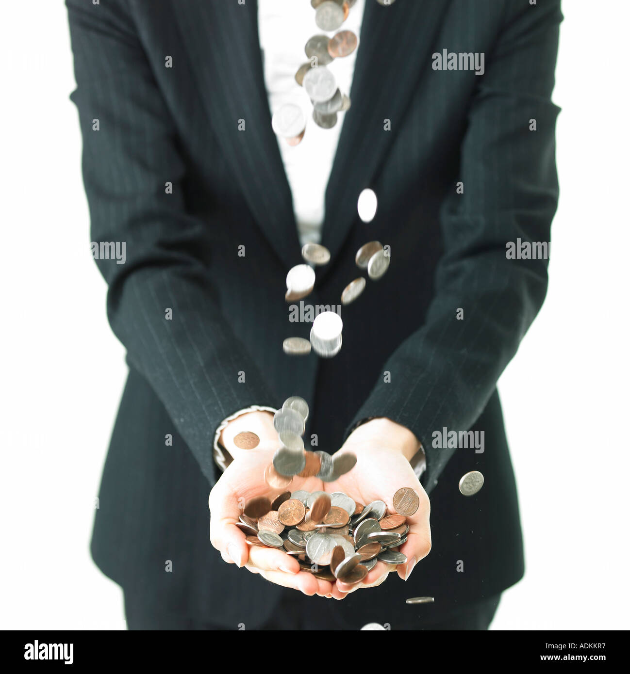 business concept dropping coins Stock Photo - Alamy