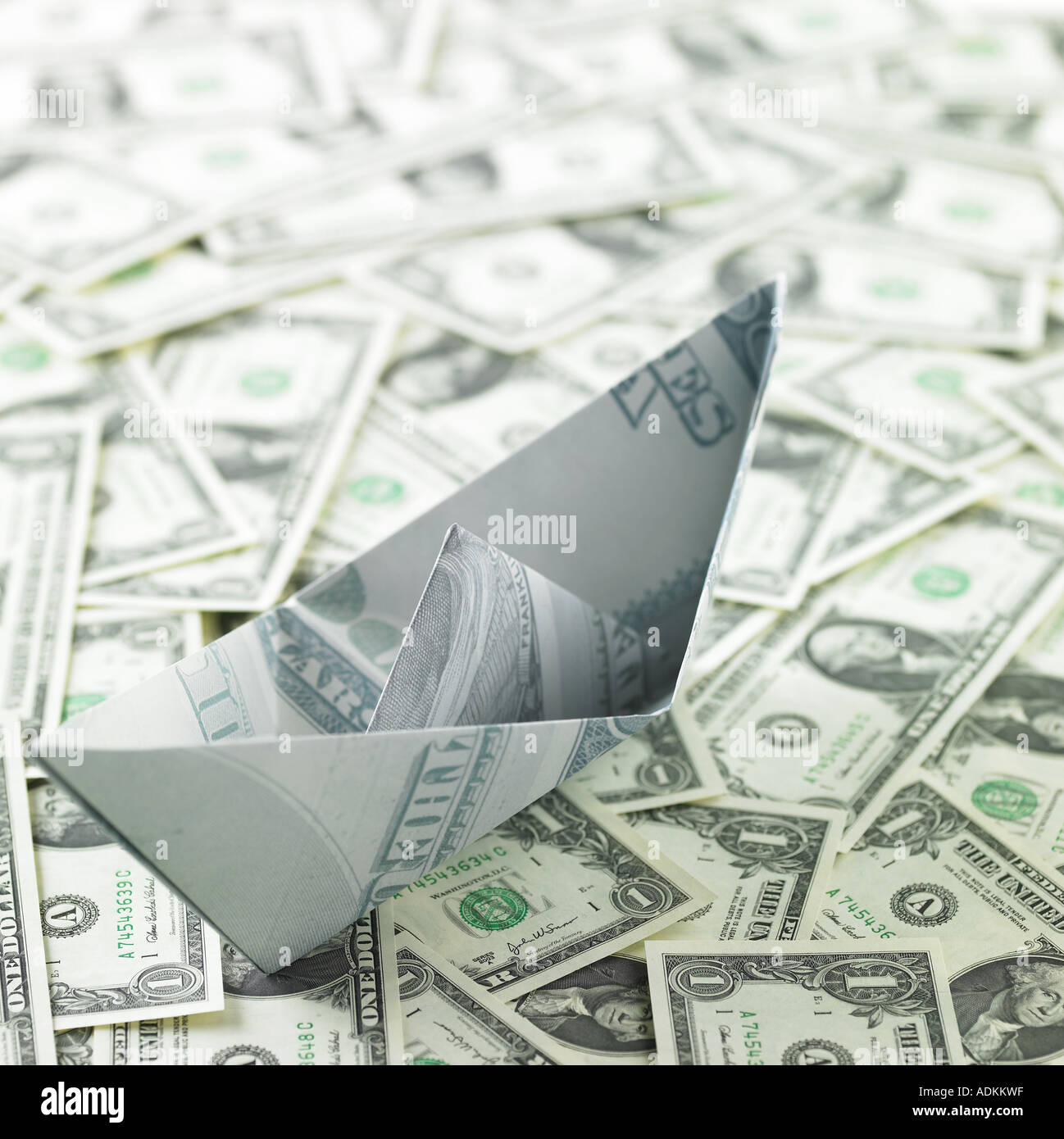 Paper boat money hi-res stock photography and images - Alamy