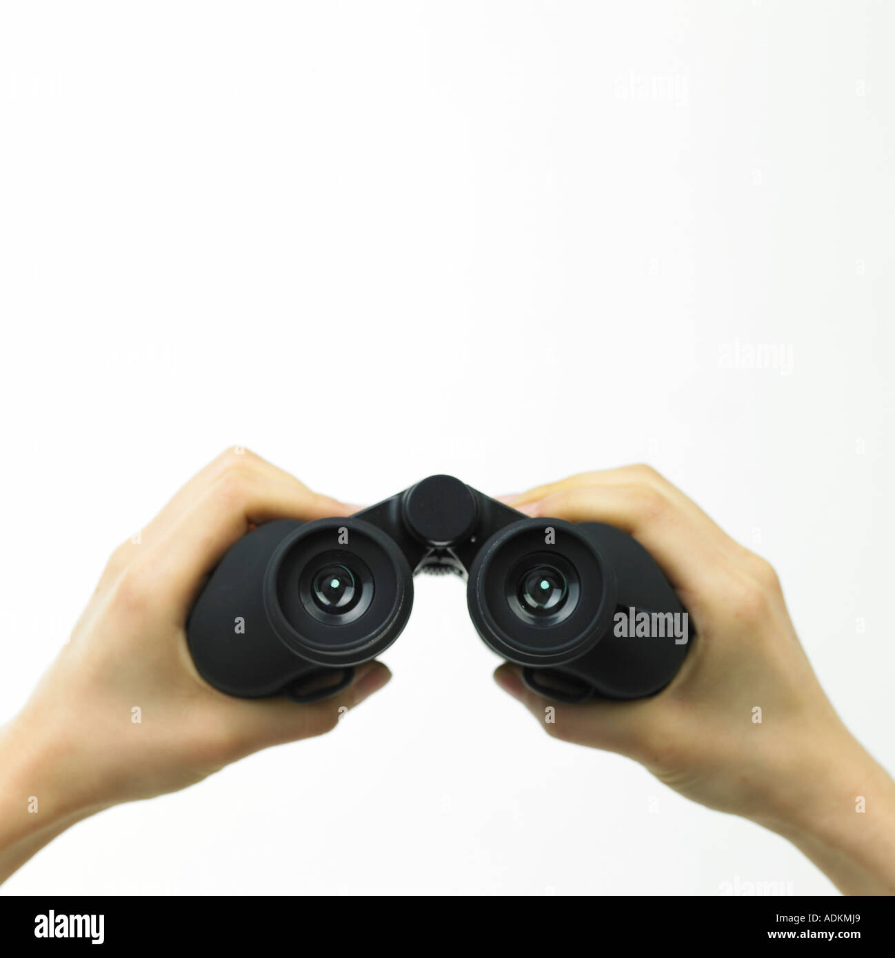 business concept a hand holding a telescope Stock Photo - Alamy