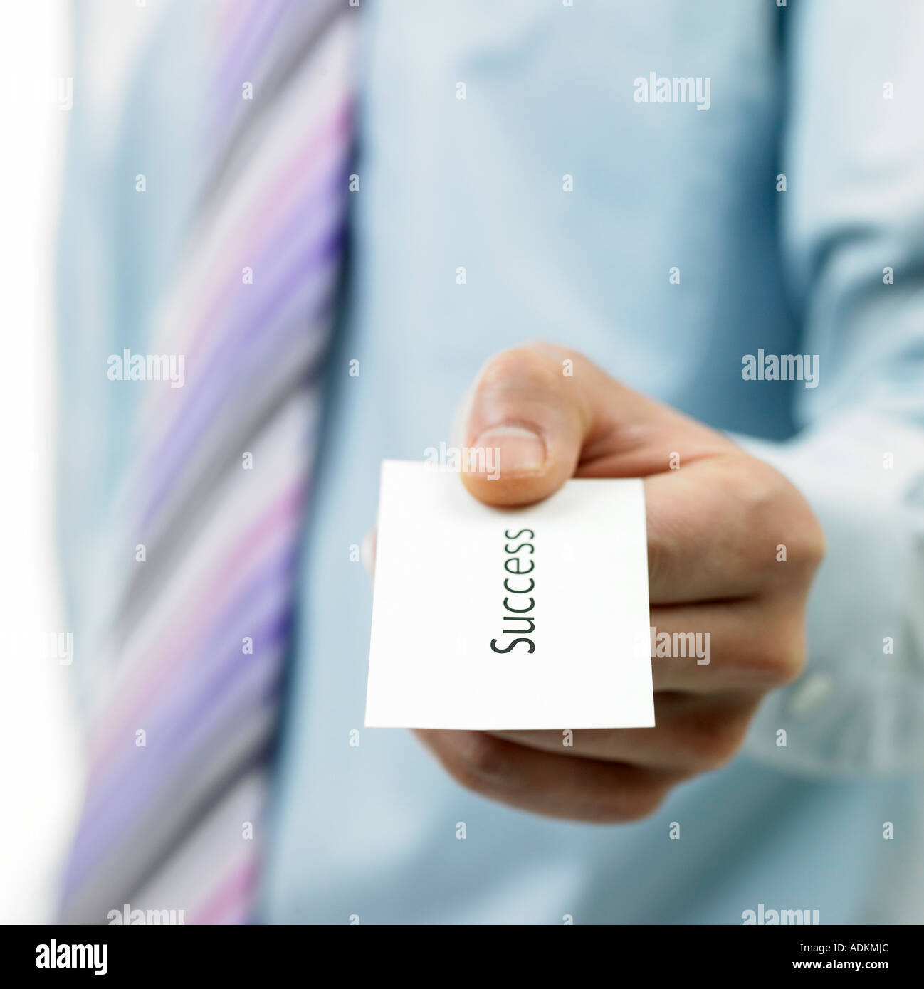 business concept a hand giving a name card Stock Photo - Alamy