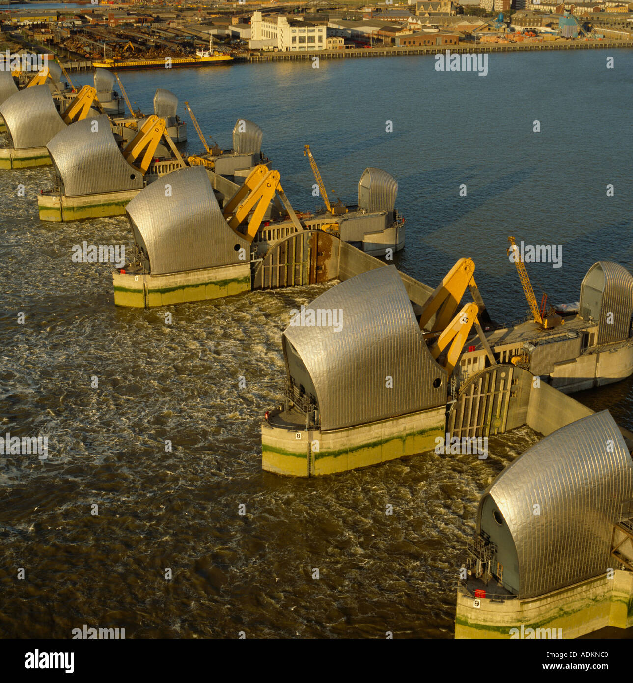 Thames Barrier flood defences in closed position Docklands London UK ...