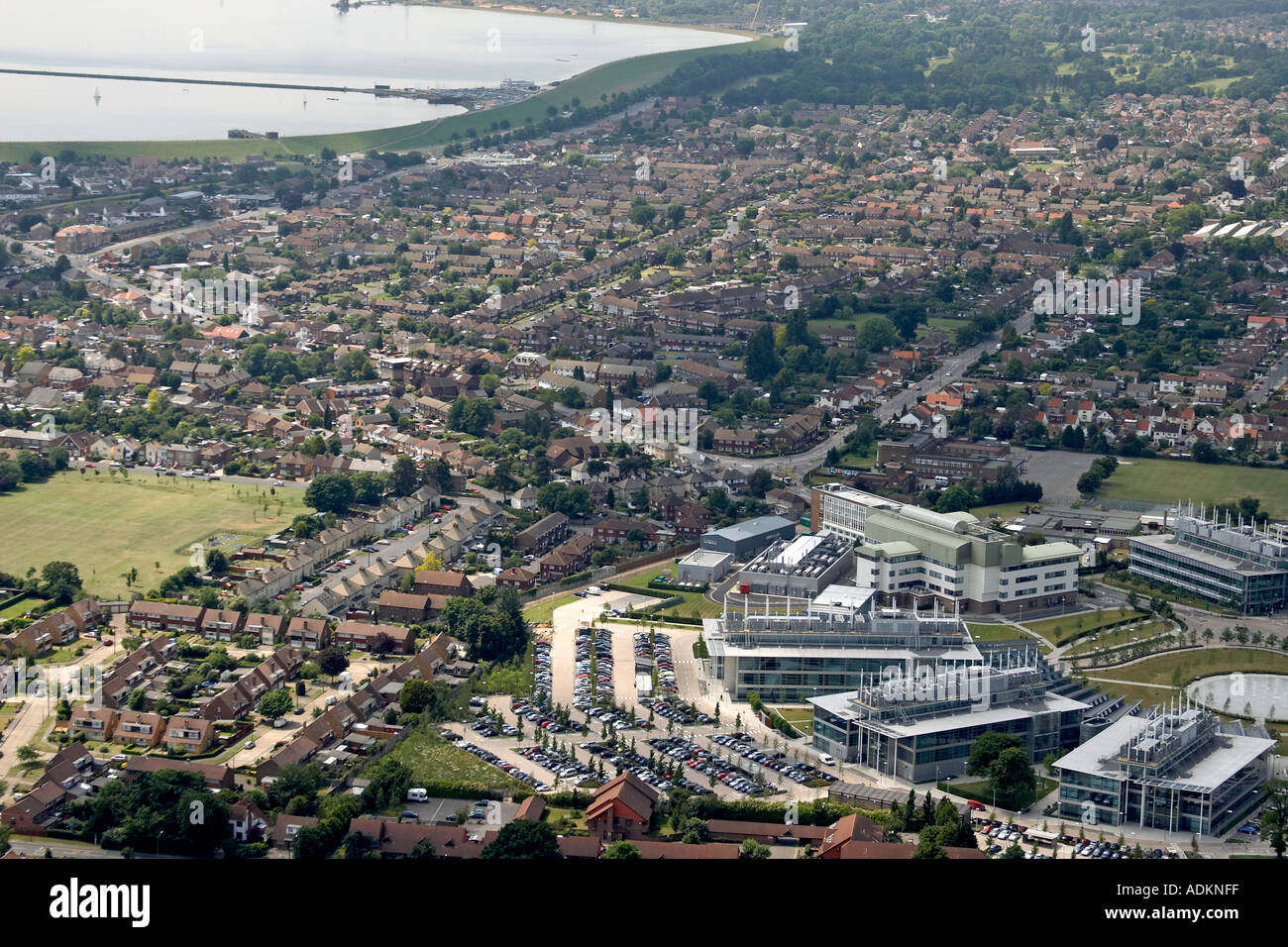 Oblique high level aerial view west to Ashford Common with Queen Mary ...