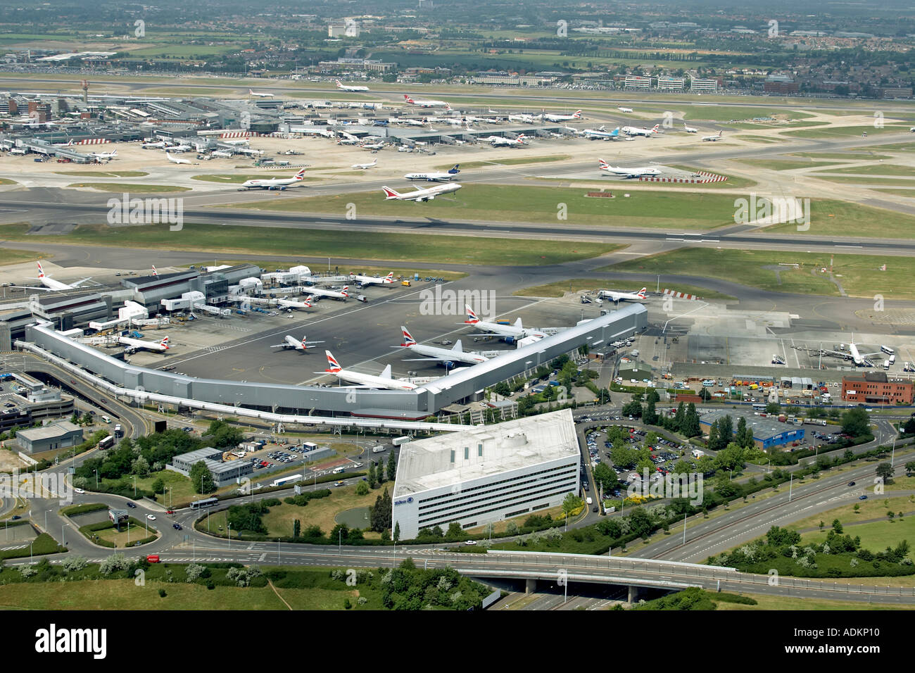 Oblique high level aerial view north west to Heathrow Airport with ...