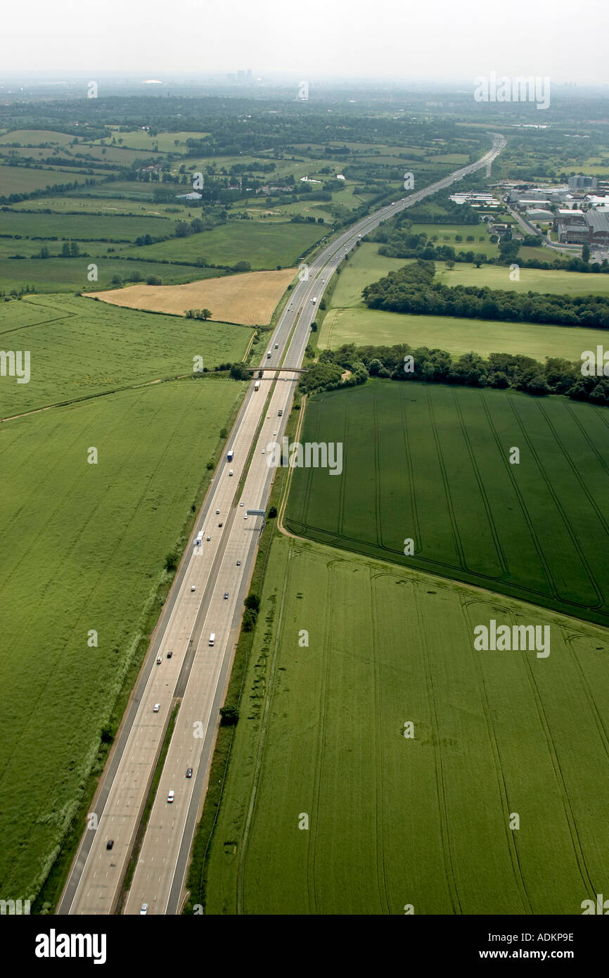 Oblique high level aerial view south west of Debden with M11 Motorway ...