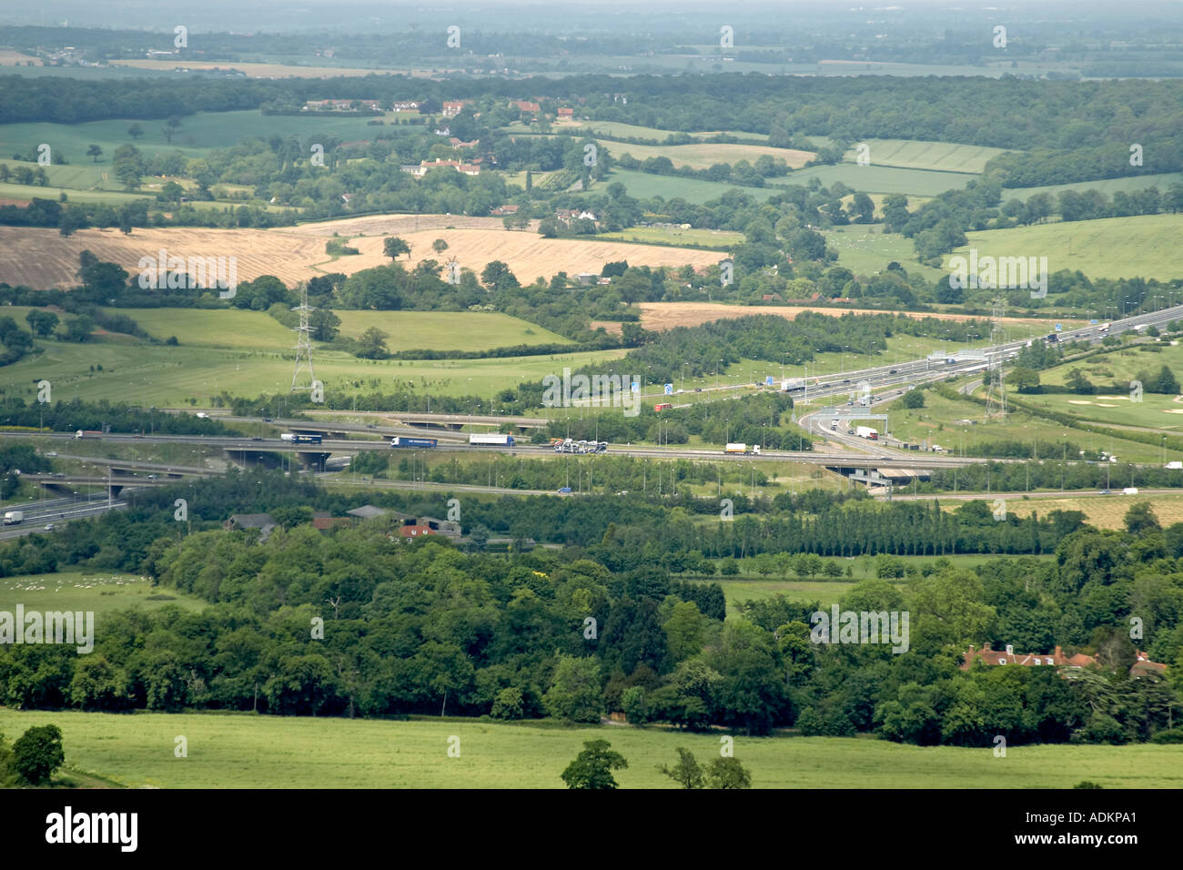 Oblique high level aerial view north of Theydon Garnon with M11 ...
