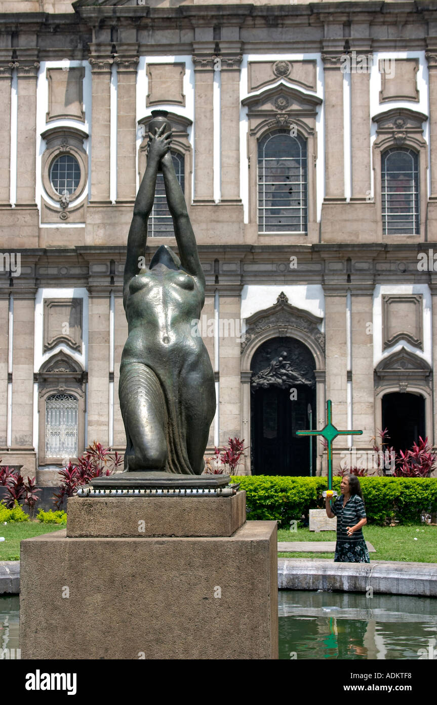 Statue of woman with woman washing herself outside Candelaria Church ...