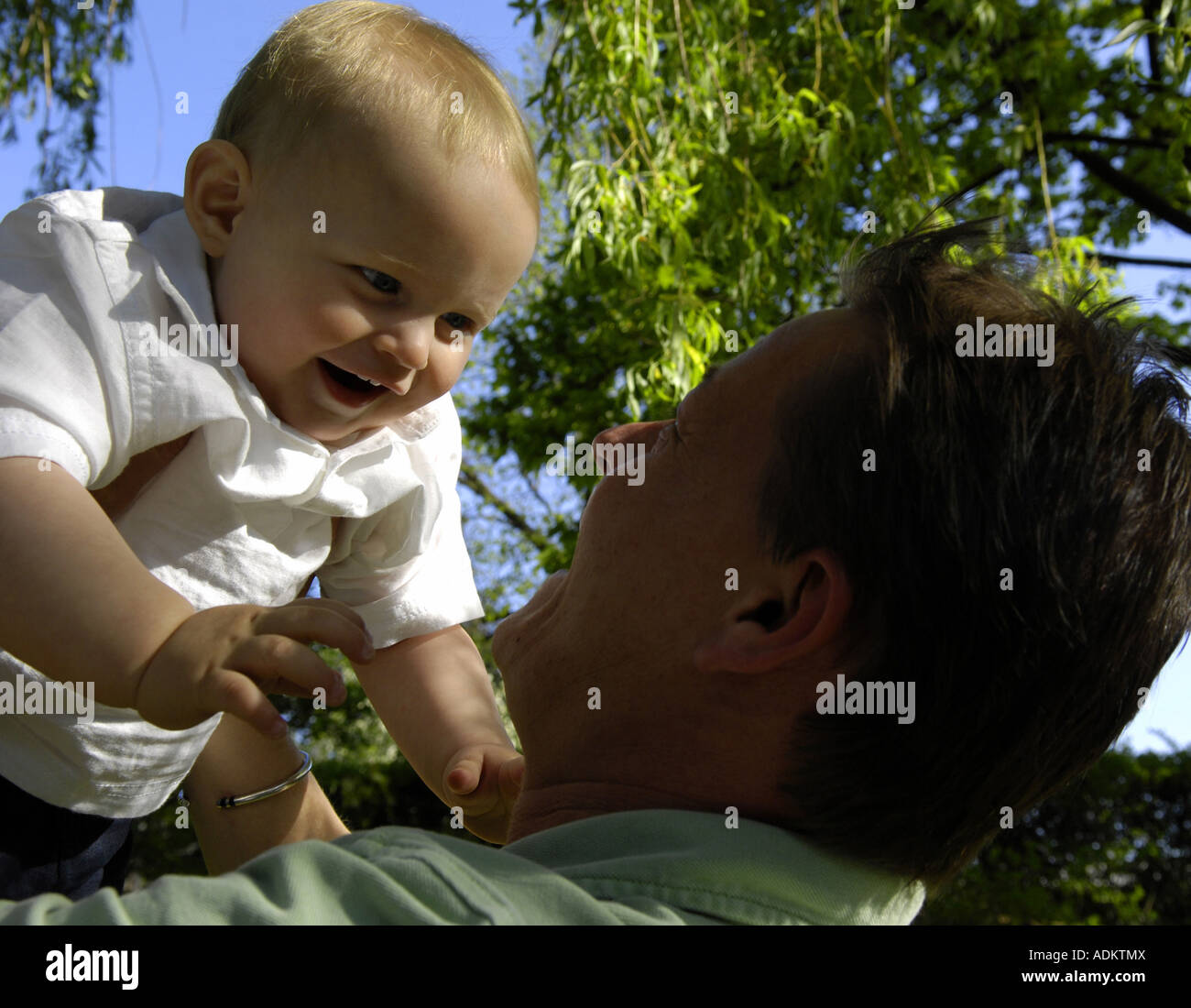 father holding baby son Stock Photo - Alamy