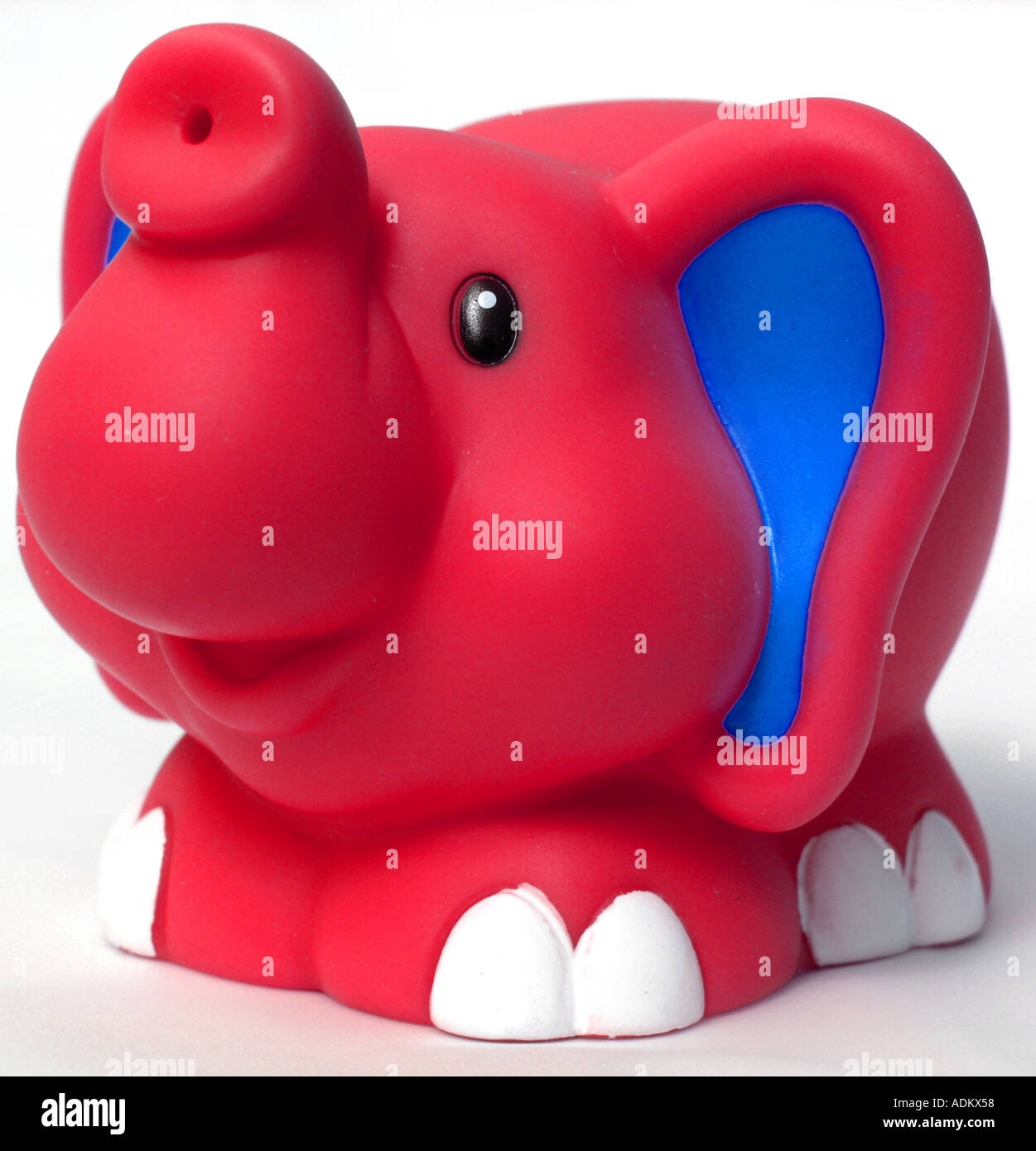 Red plastic elephant Stock Photo - Alamy