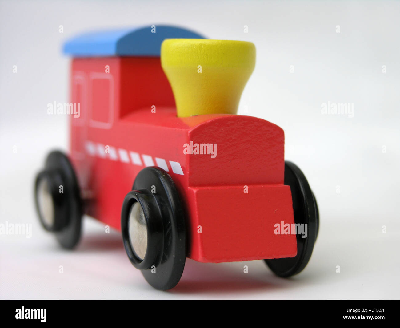 Red wooden toy train engine Stock Photo - Alamy