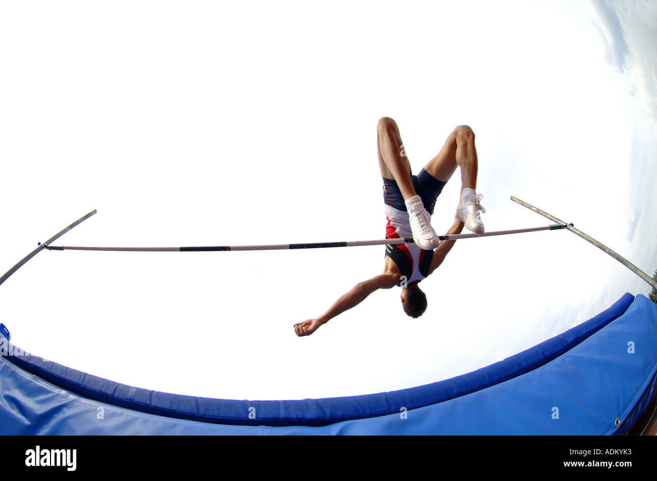 Male High Jumper Clearing the Bar Stock Photo - Alamy