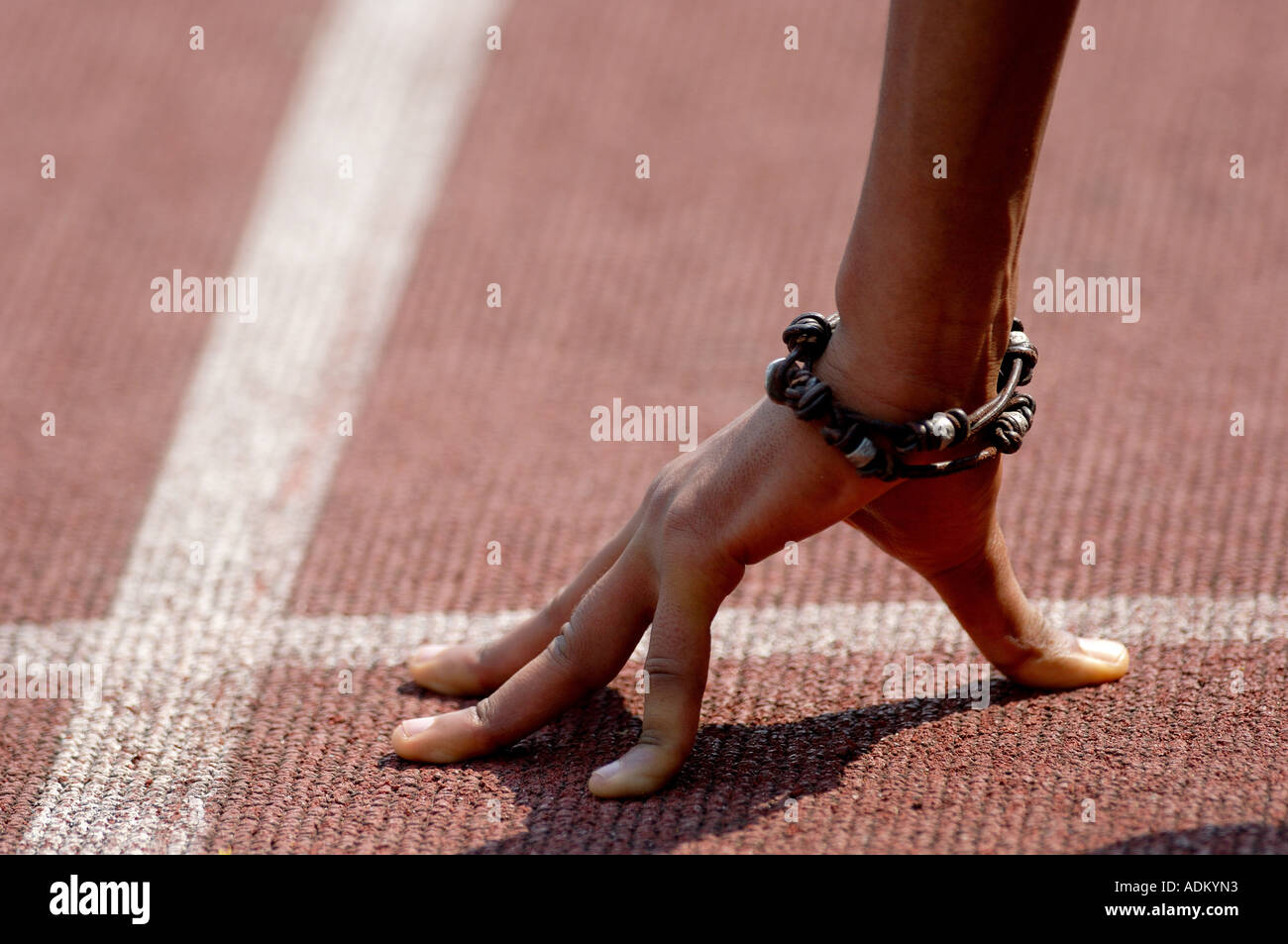 Hand of a Male Runner Pressed Against the Surface of a Track Stock ...