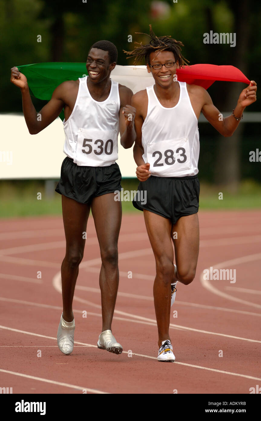 Runners carrying flag hi-res stock photography and images - Alamy
