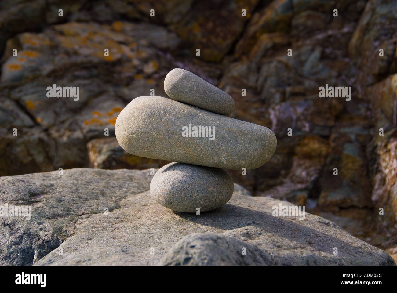 A Stack of three Balancing Pebbles Stock Photo - Alamy