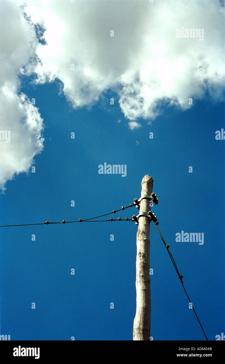 improvised electricity pole with wires Stock Photo - Alamy