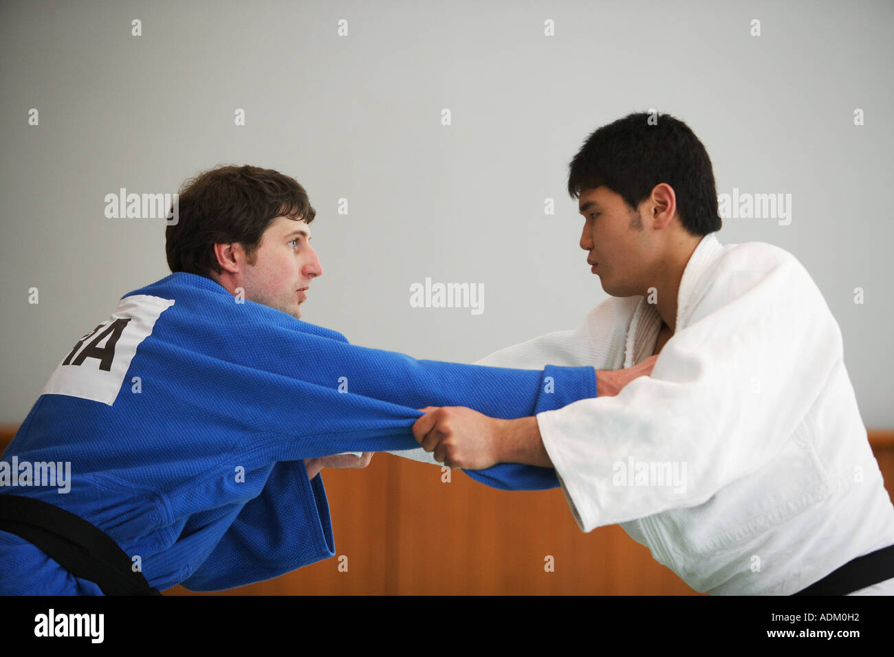 Two Men Competing in a Judo Match Stock Photo - Alamy
