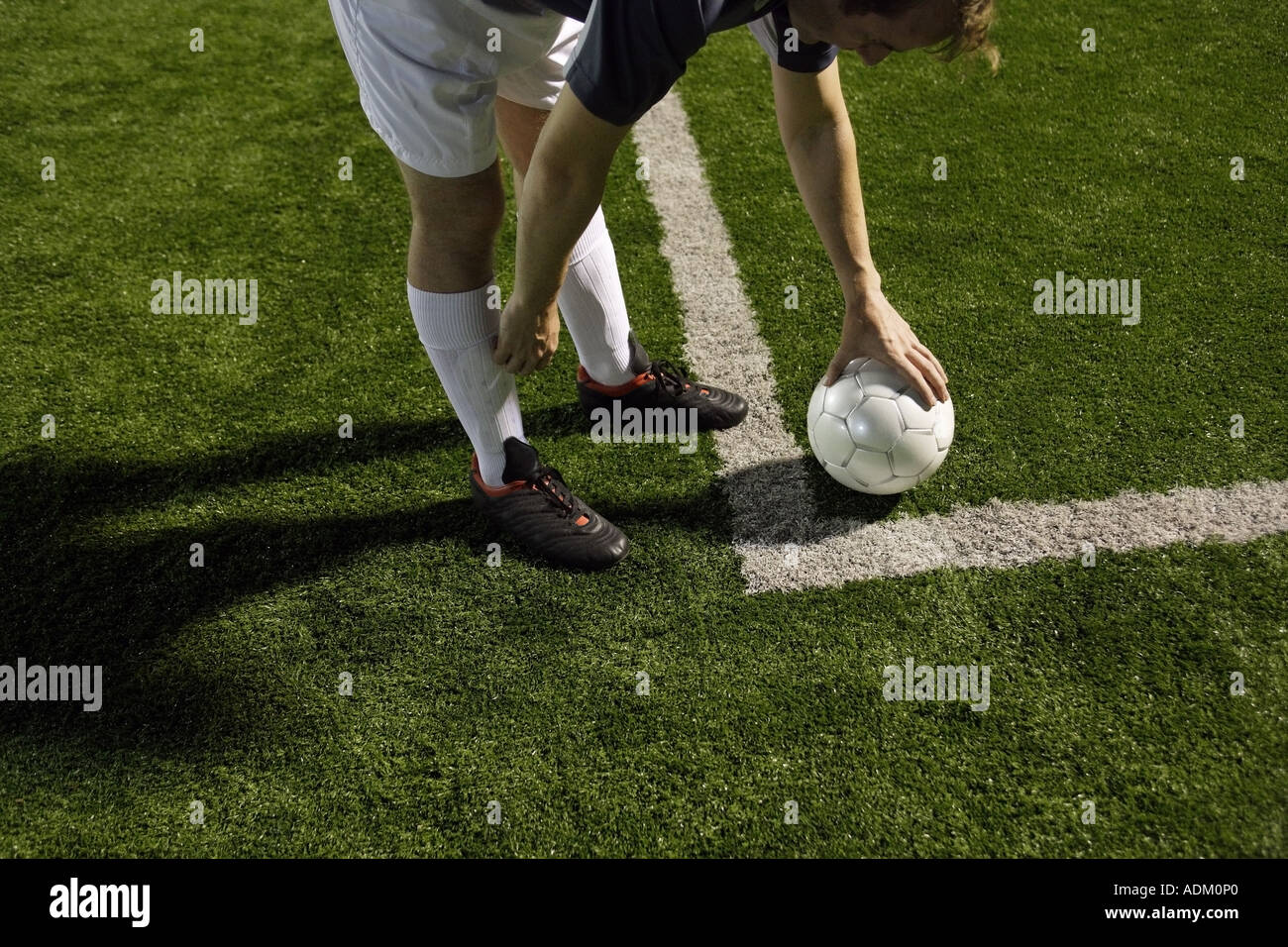 Soccer Player Setting Up A Corner Kick Stock Photo - Alamy