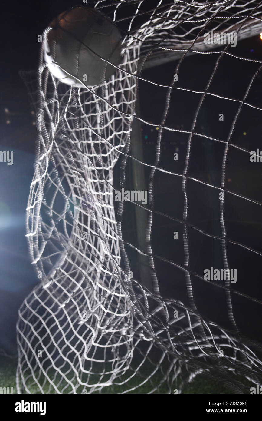 Soccer Ball Flying Into Net Stock Photo - Alamy