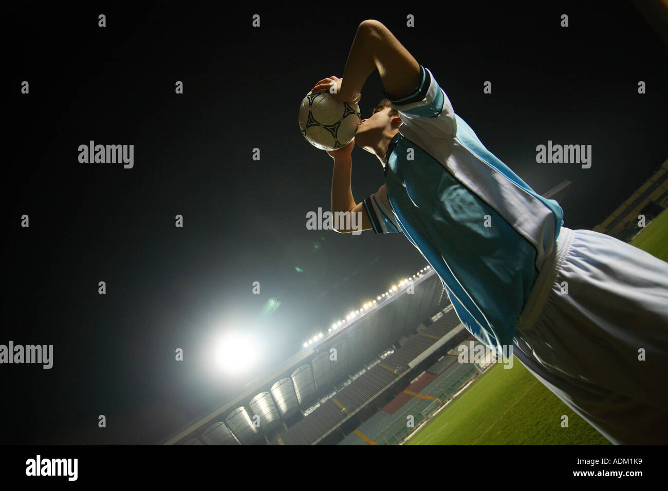 Soccer player kissing ball hi-res stock photography and images - Alamy