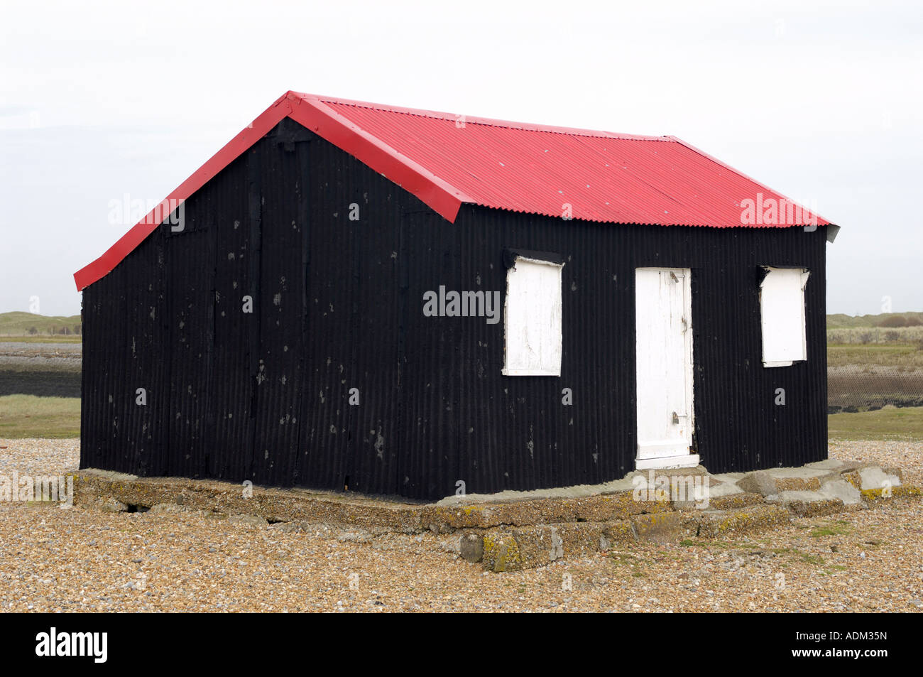 A small hut next to Rye Harbour inlet Rye East Sussex England Stock ...
