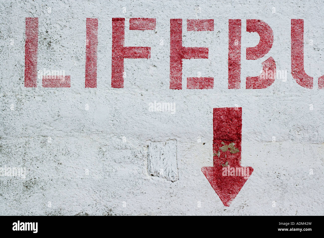 Lifebuoy sign painted onto a wall Stock Photo - Alamy