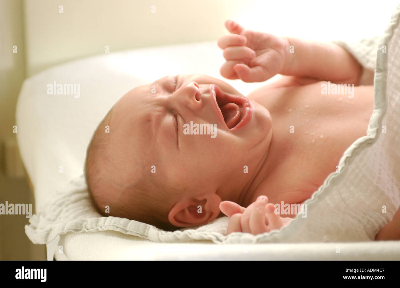 Newborn baby crying Stock Photo - Alamy