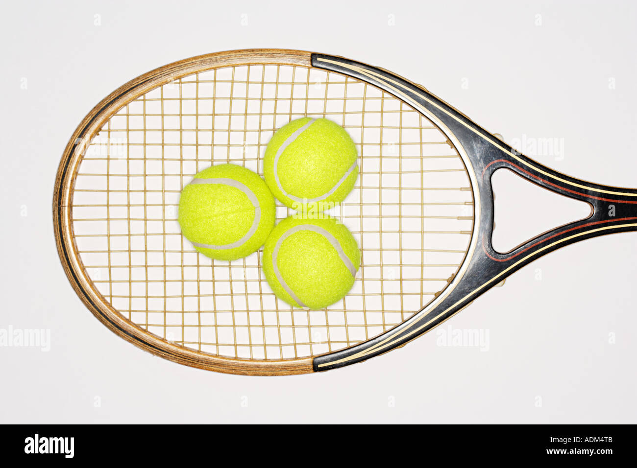 Tennis racket and tennis balls Stock Photo - Alamy