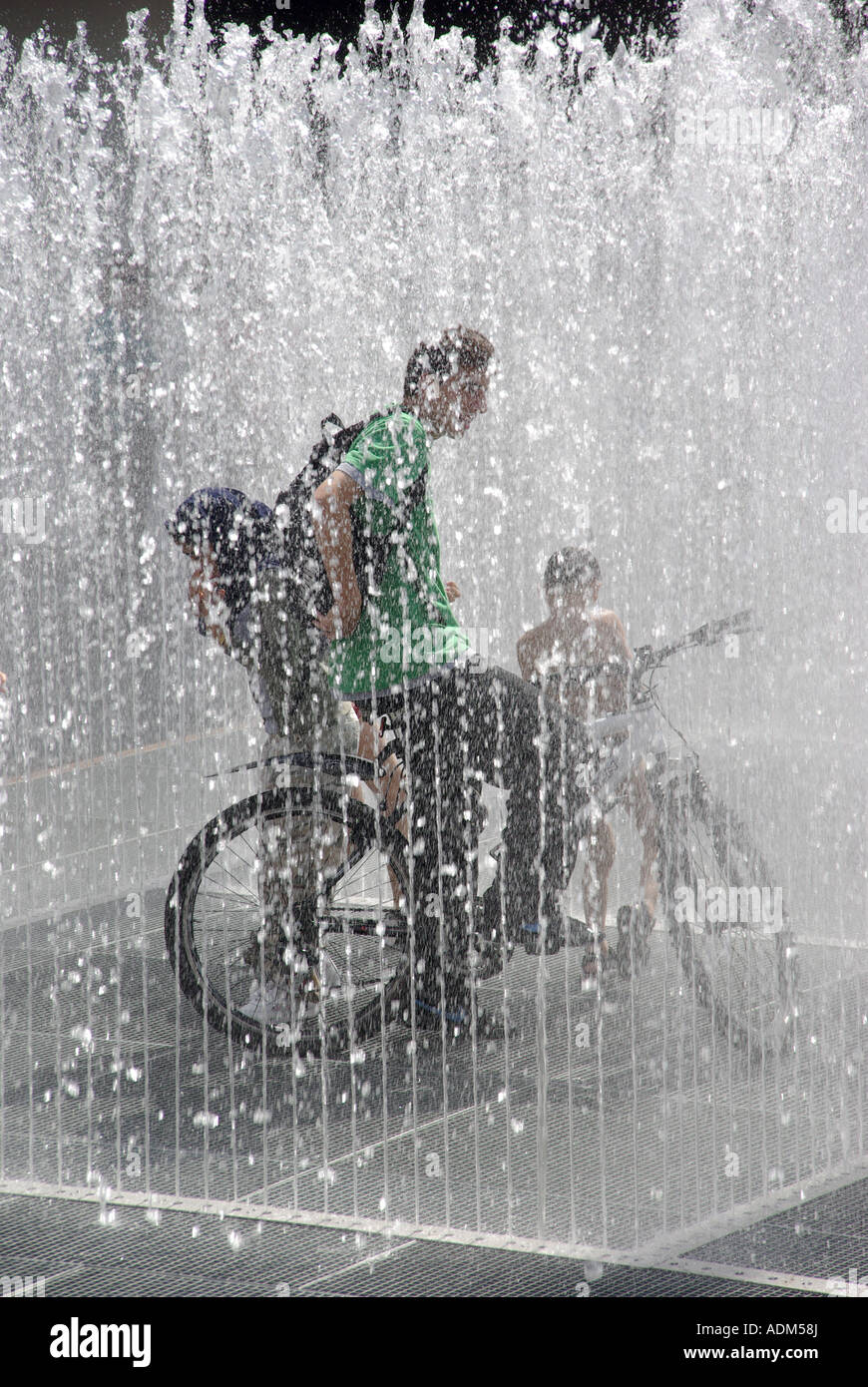 London Appearing Rooms water fountain feature cyclist sitting on bike ...
