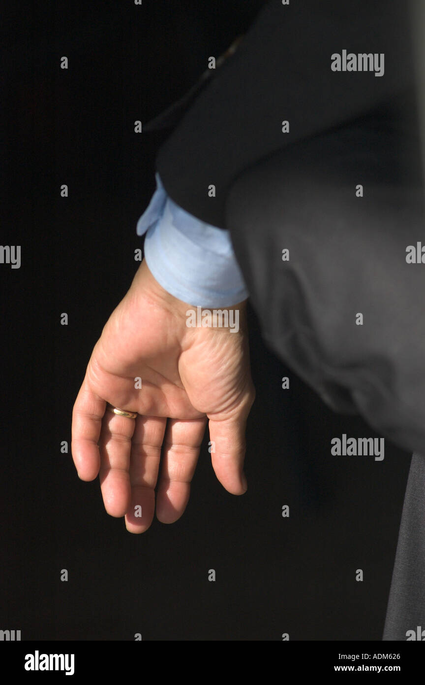 man s hand with a ring Stock Photo - Alamy