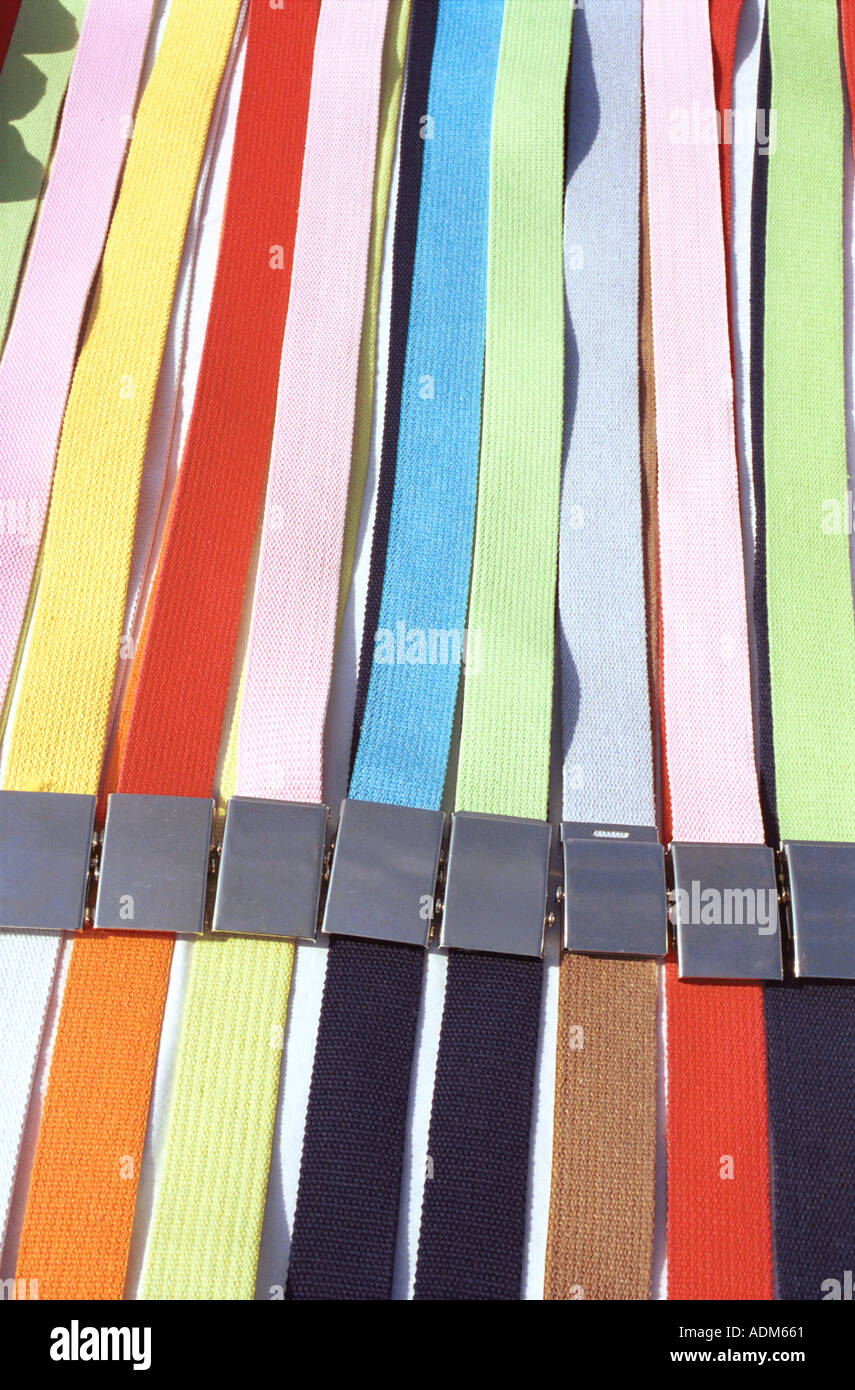 colourful canvas belts on display Stock Photo - Alamy
