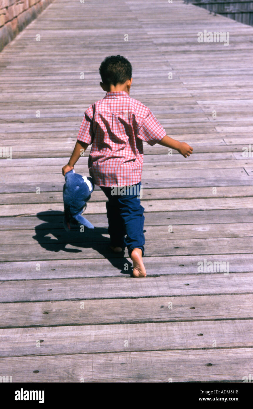 Scared child running hi-res stock photography and images - Alamy