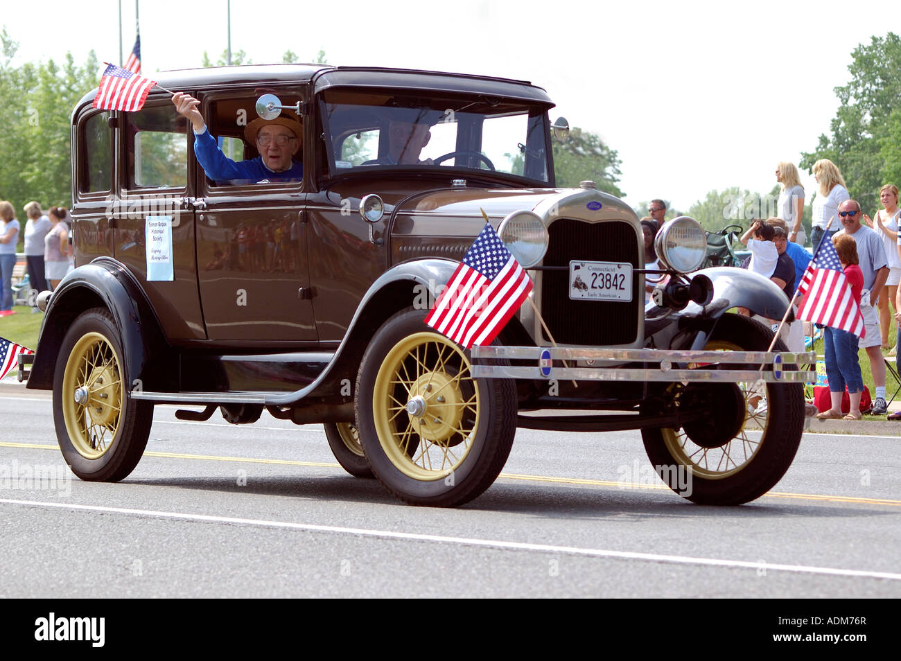 A 1930s Model A Ford Sedan being driven in a memorial parade in ...