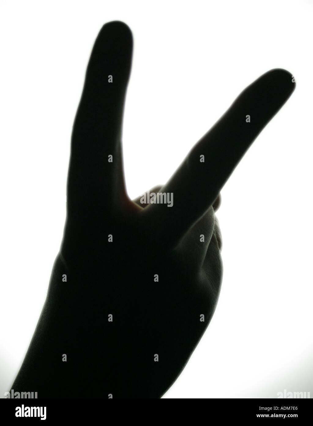 Two finger offensive gesture Stock Photo - Alamy