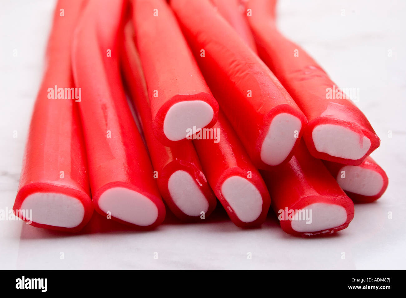 Red strips of child's chewy sweets with red colouring Stock Photo - Alamy