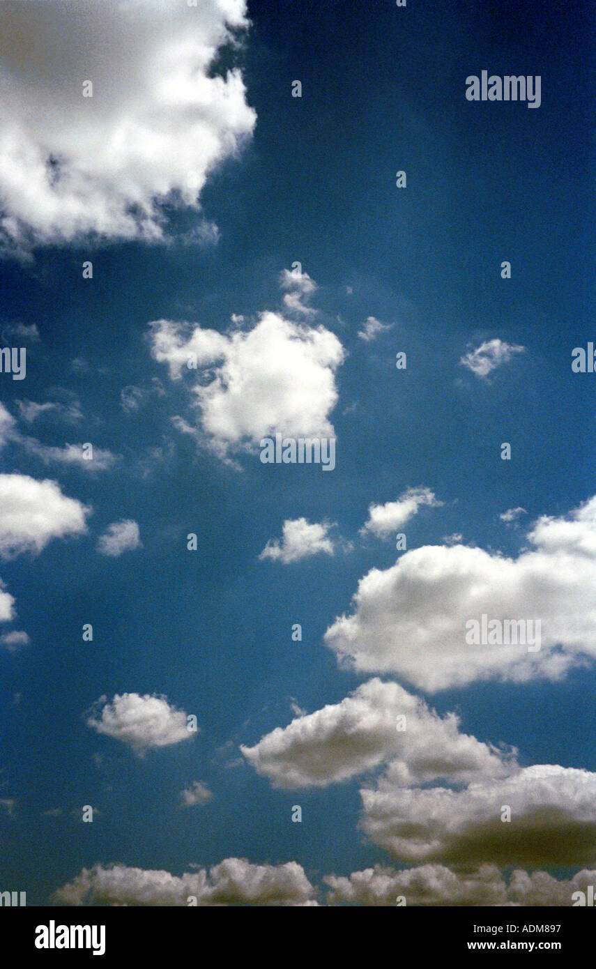 fluffy white clouds and blue sky Stock Photo - Alamy