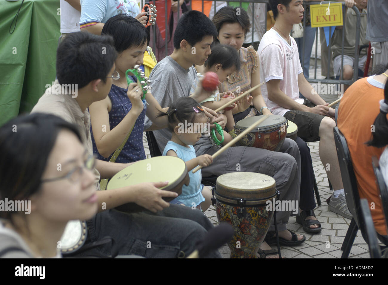 People playing musical instruments next to the Museum of Art Avenue of ...