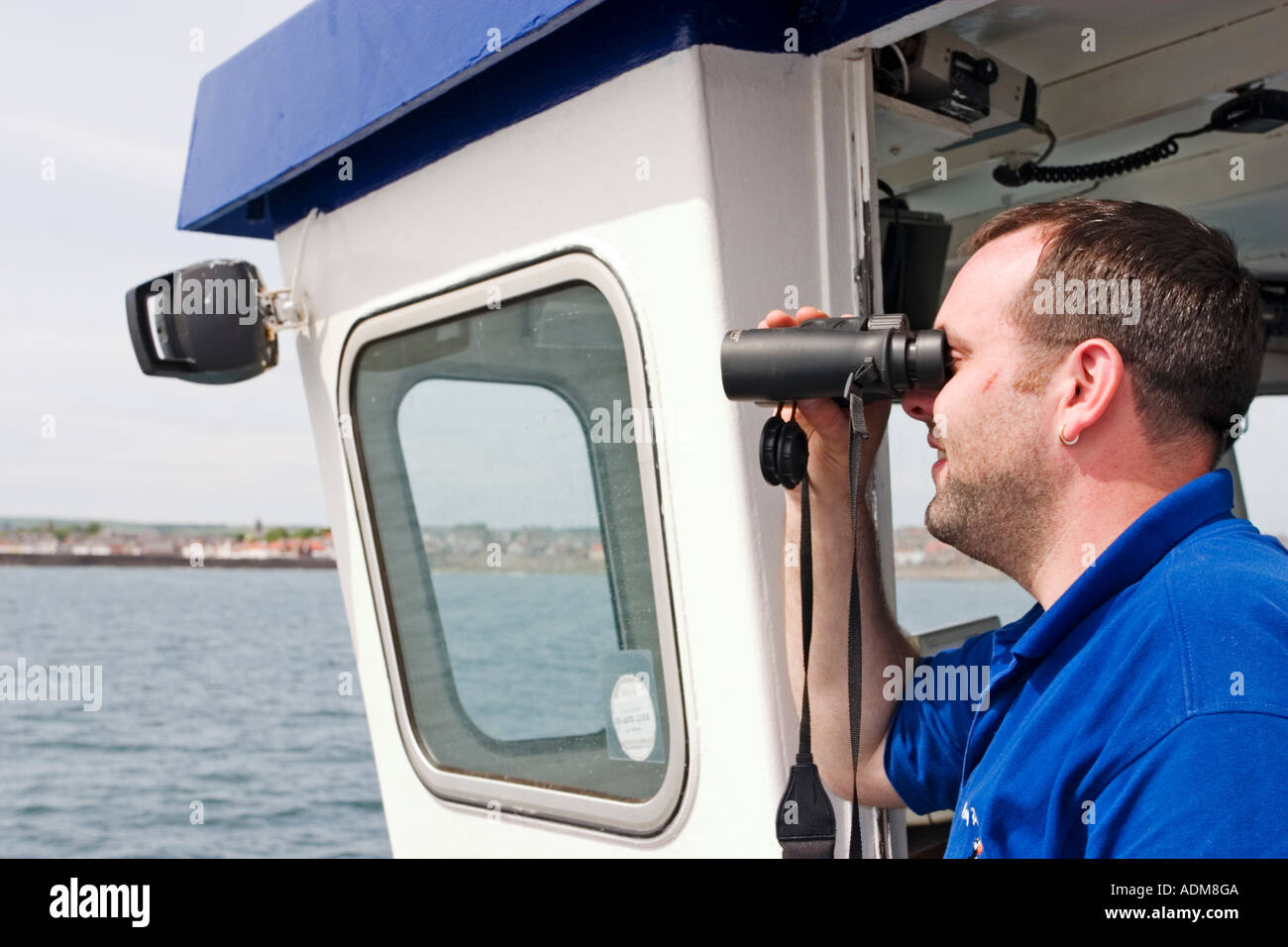 Ship and captain and binoculars hi-res stock photography and images - Alamy