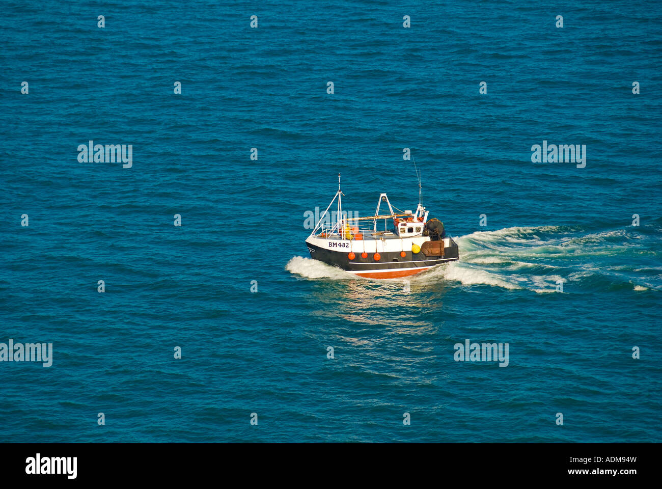 Inshore Trawler Fishing Boat Returning Home Stock Photo - Alamy