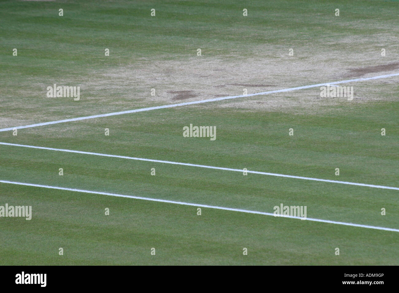 View of grass tennis court baseline Stock Photo - Alamy