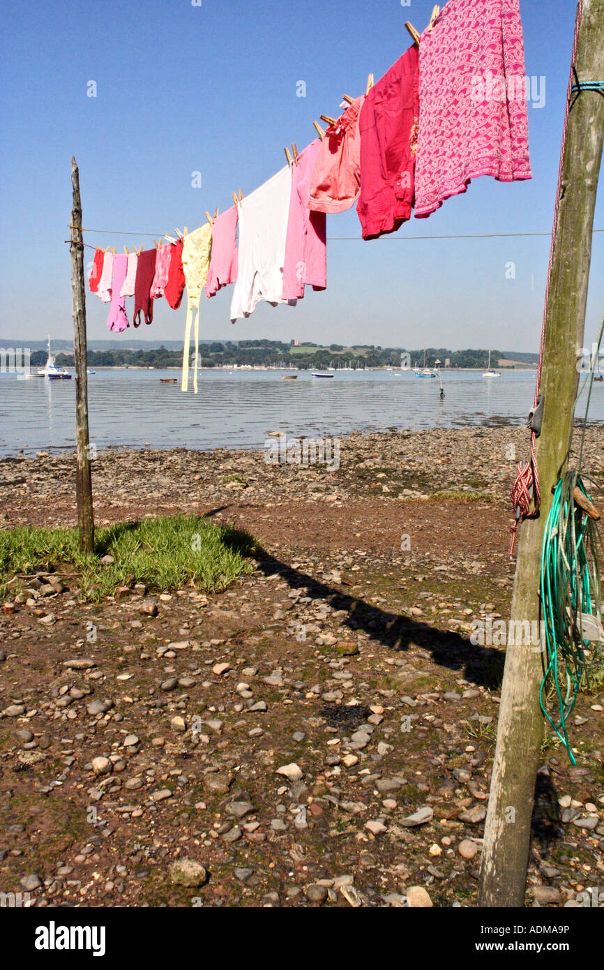 a washing line on a beach in Devon, england Stock Photo - Alamy