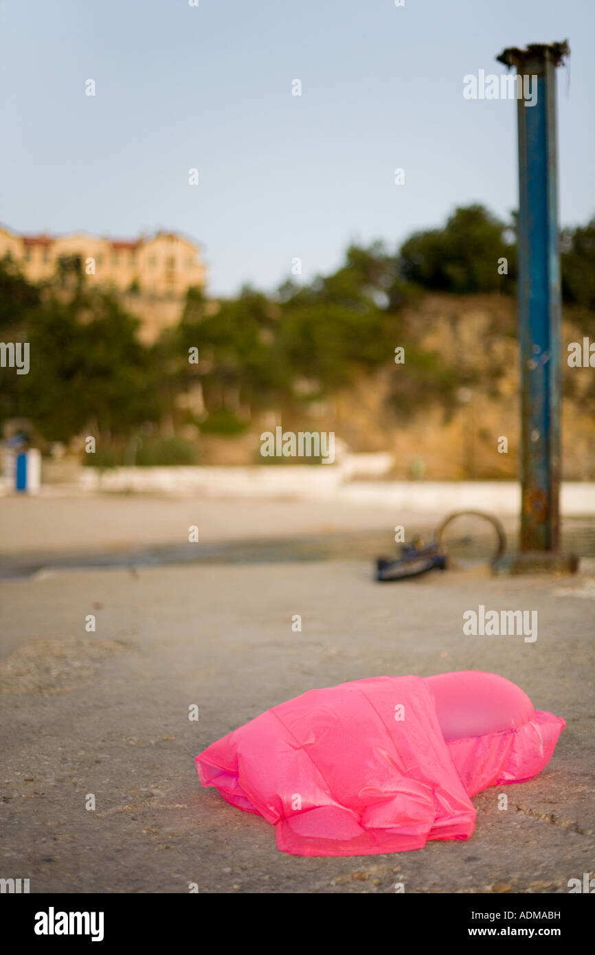 Childs inflatable, deflated and disguarded Stock Photo - Alamy