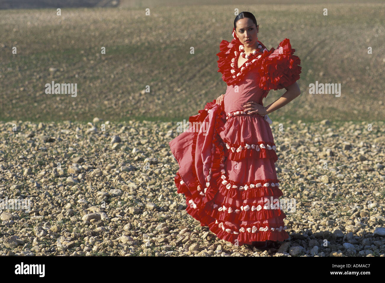 Spanish young woman dressed in sevillana traditional attire MR Seville ...