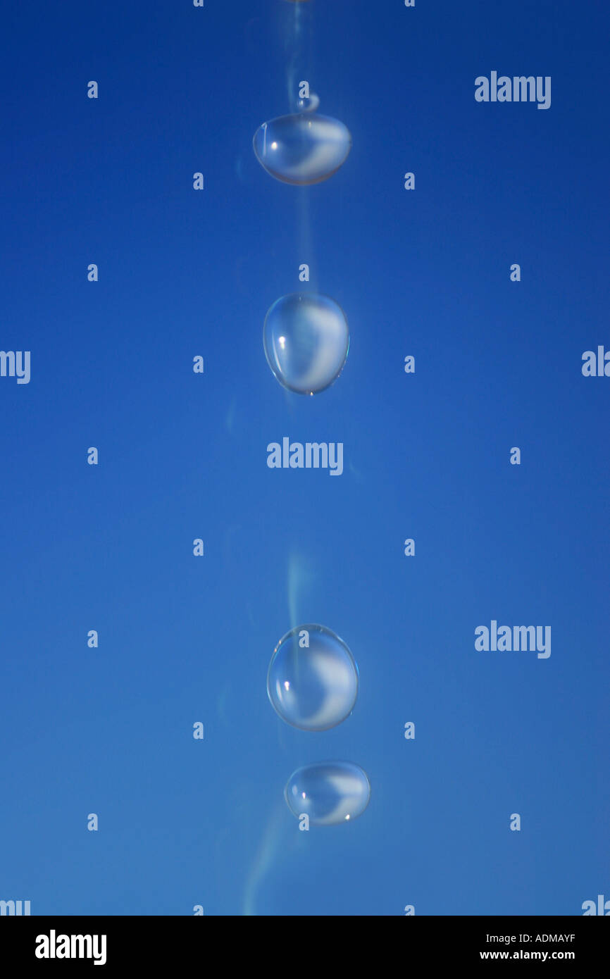 Water droplets falling Stock Photo - Alamy
