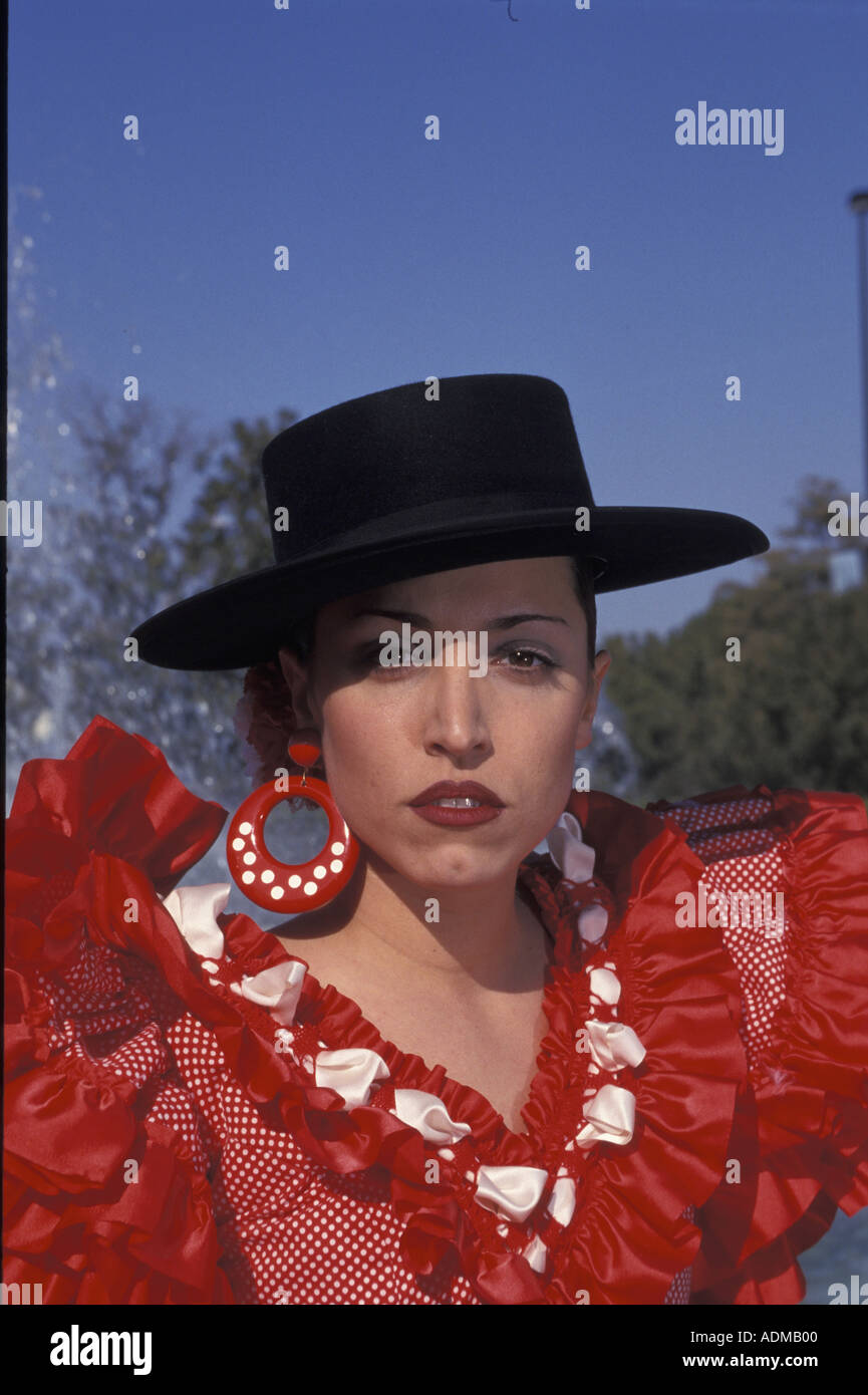 Spanish young woman dressed in sevillana traditional attire MR Seville ...