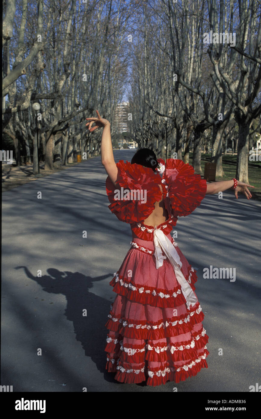 Spanish young woman dressed in sevillana traditional attire MR Seville ...