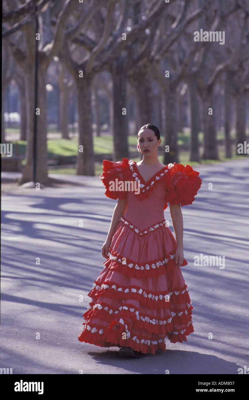 Spanish young woman dressed in sevillana traditional attire MR Seville ...