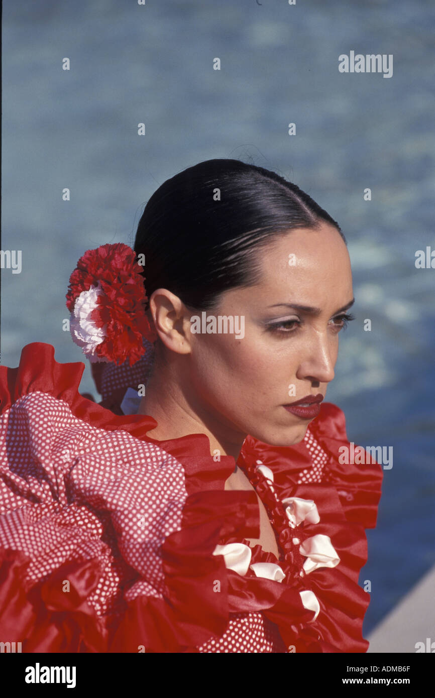 Spanish young woman dressed in sevillana traditional attire MR Seville ...
