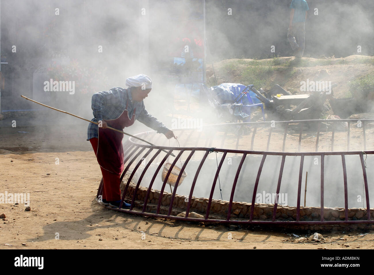Cooking in a natural steam hole Stock Photo - Alamy